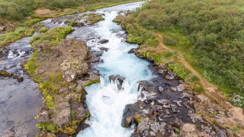 How to Visit Brúarfoss Waterfall (and Is It Worth It?) | Earth Trekkers